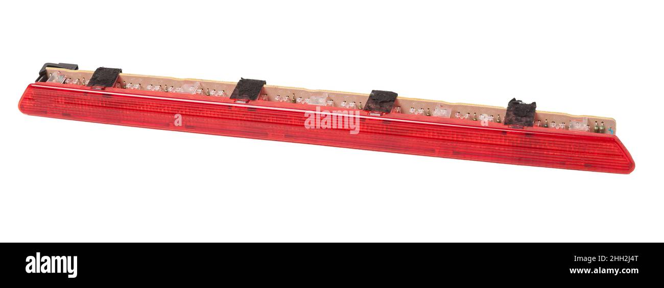 Close-up on an isolated led rear light of a car on white background ...