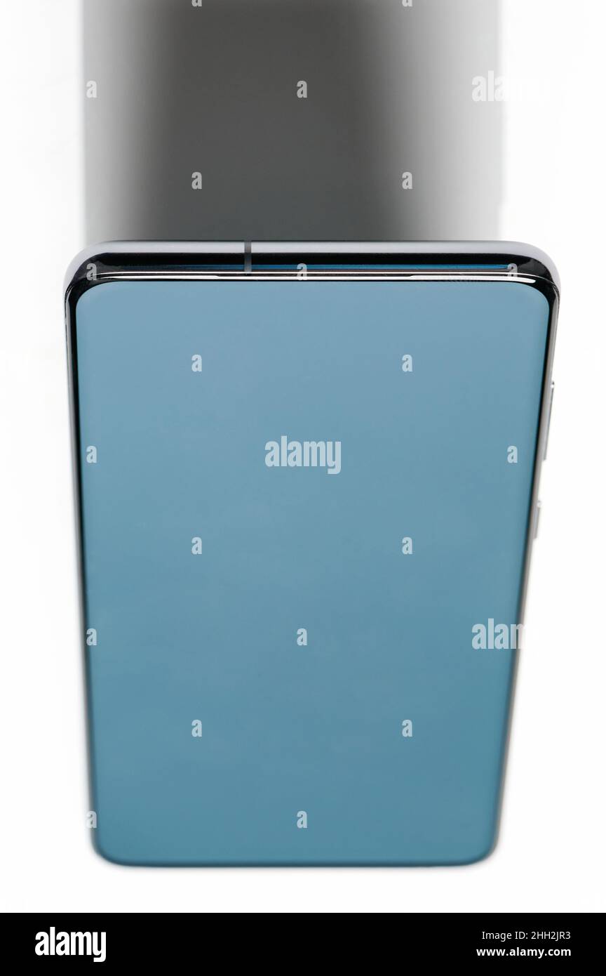 Front above view of modern smartphone with shade isolated on white ...