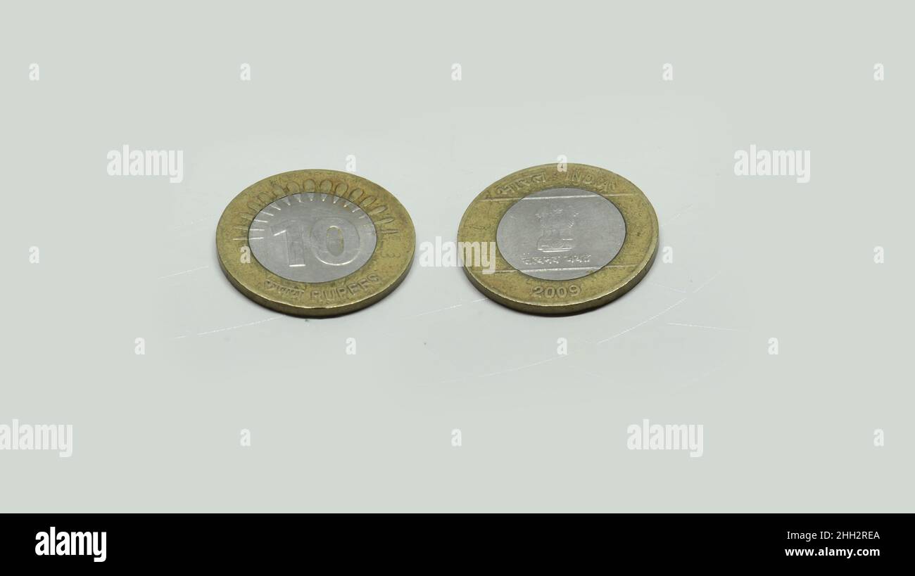 old Indian Rupee Ten Rupee Coins. On a white background Stock Photo - Alamy