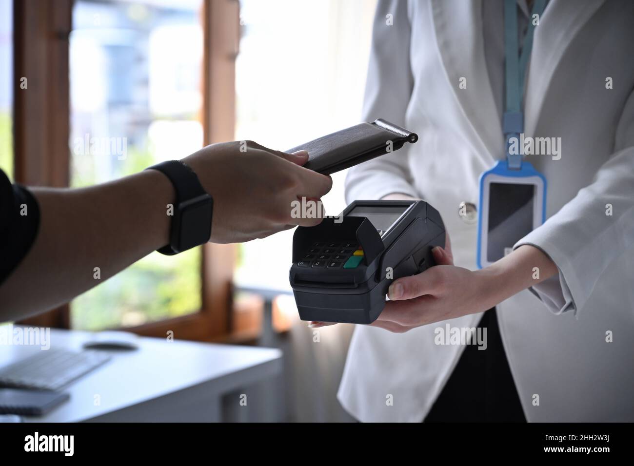 Customer using smart phone scanning for contactless payment Stock Photo ...