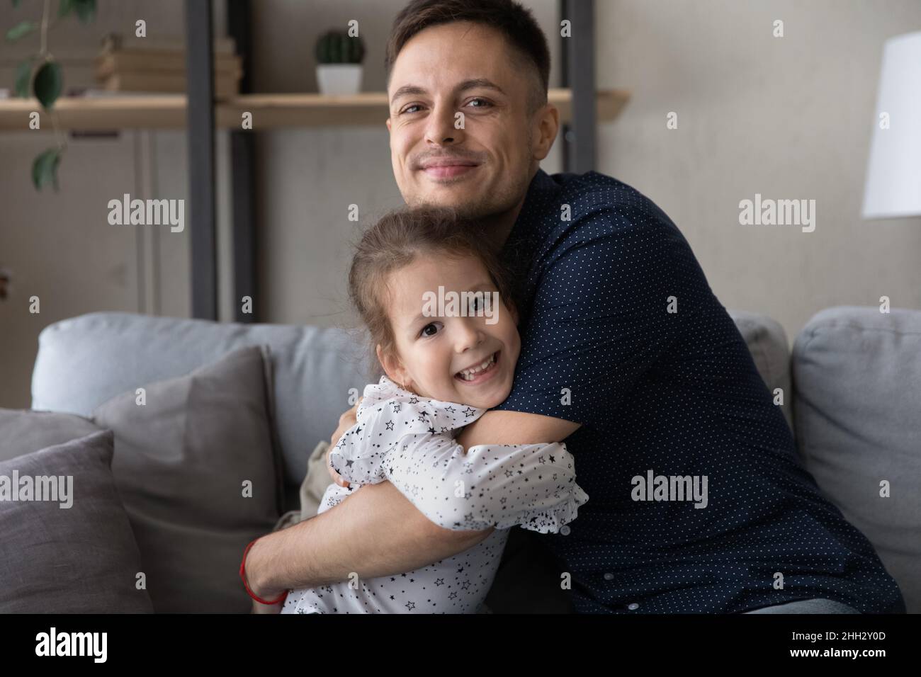 Portrait of sincere bonding two generations family Stock Photo - Alamy