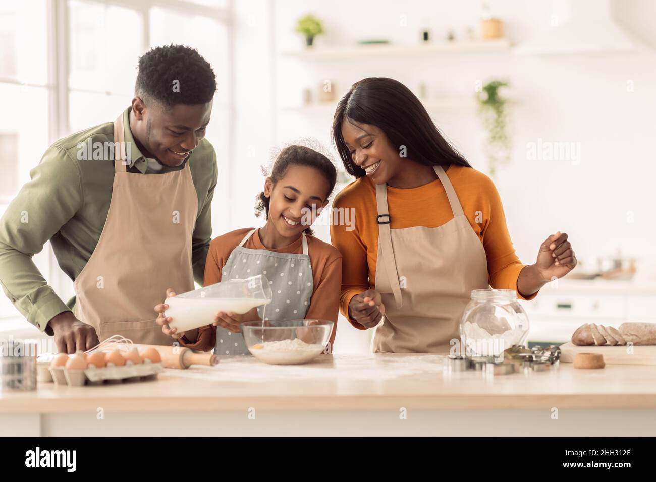 Child adding flour hi-res stock photography and images - Alamy