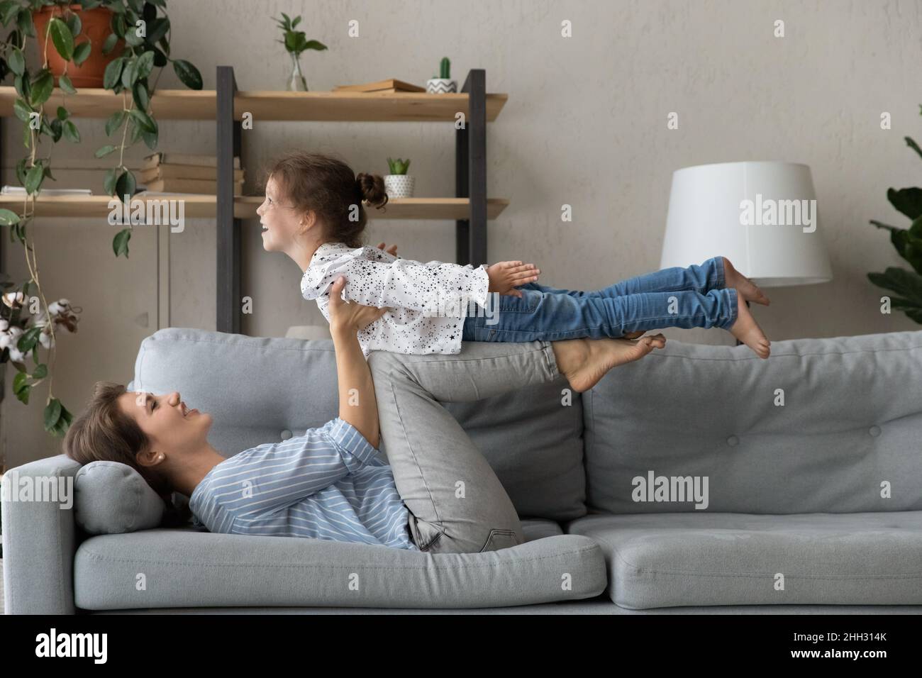 Child carry lift hi-res stock photography and images - Alamy