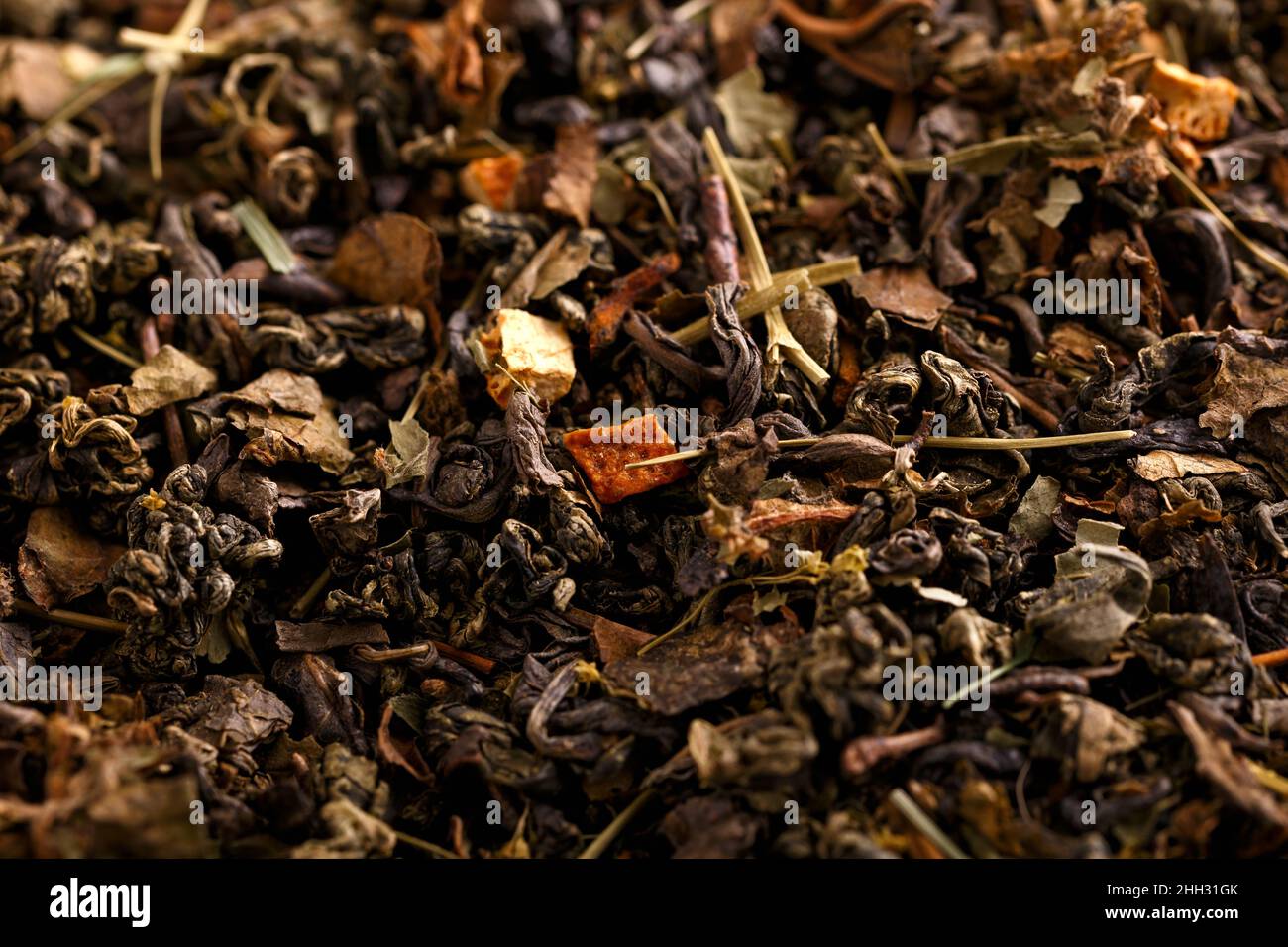 Dry green leaf tea mix. Background, texture Stock Photo - Alamy