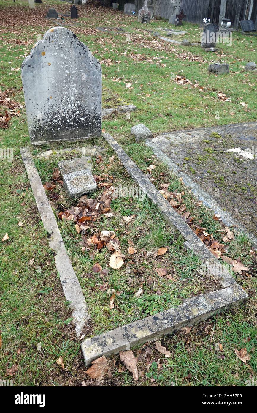 A Old Graveyard with Broken and Fallen Crosses and Graves in Overgrown Grass Spooky Stock Photo ...
