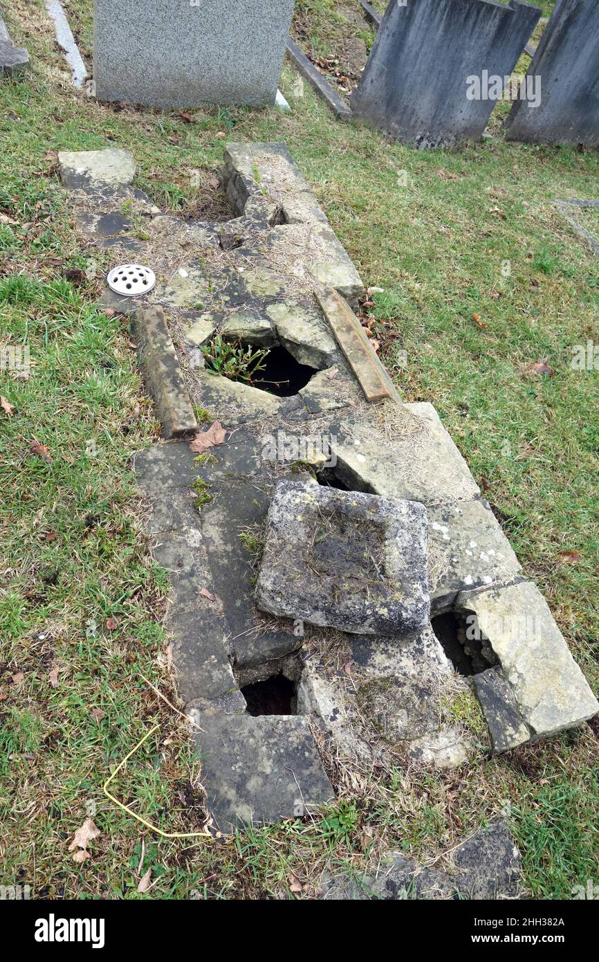 A Old Graveyard with Broken and Fallen Crosses and Graves in Overgrown ...