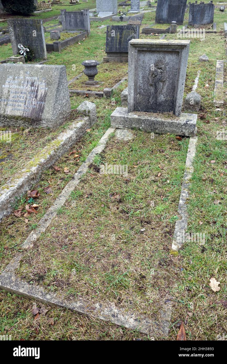 A Old Graveyard with Broken and Fallen Crosses and Graves in Overgrown Grass Spooky Stock Photo ...