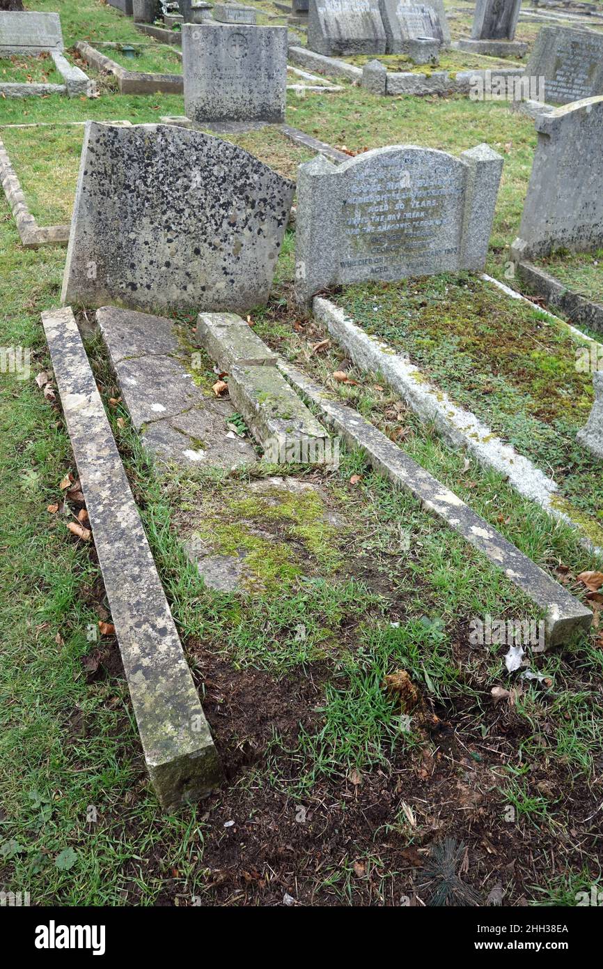 A Old Graveyard with Broken and Fallen Crosses and Graves in Overgrown ...