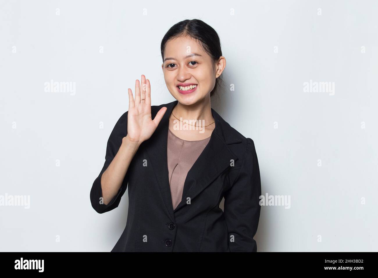 Asian business woman say hello isolated on white background Stock Photo ...