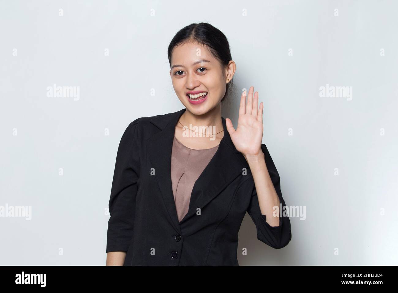 Asian business woman say hello isolated on white background Stock Photo ...