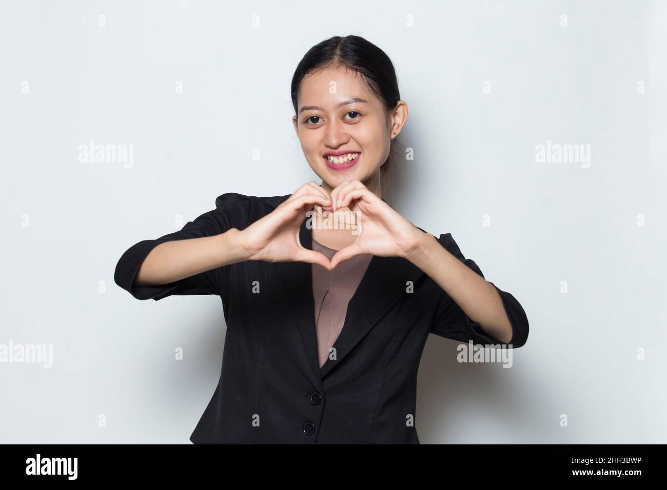 Thai woman hand sign love hi-res stock photography and images - Alamy