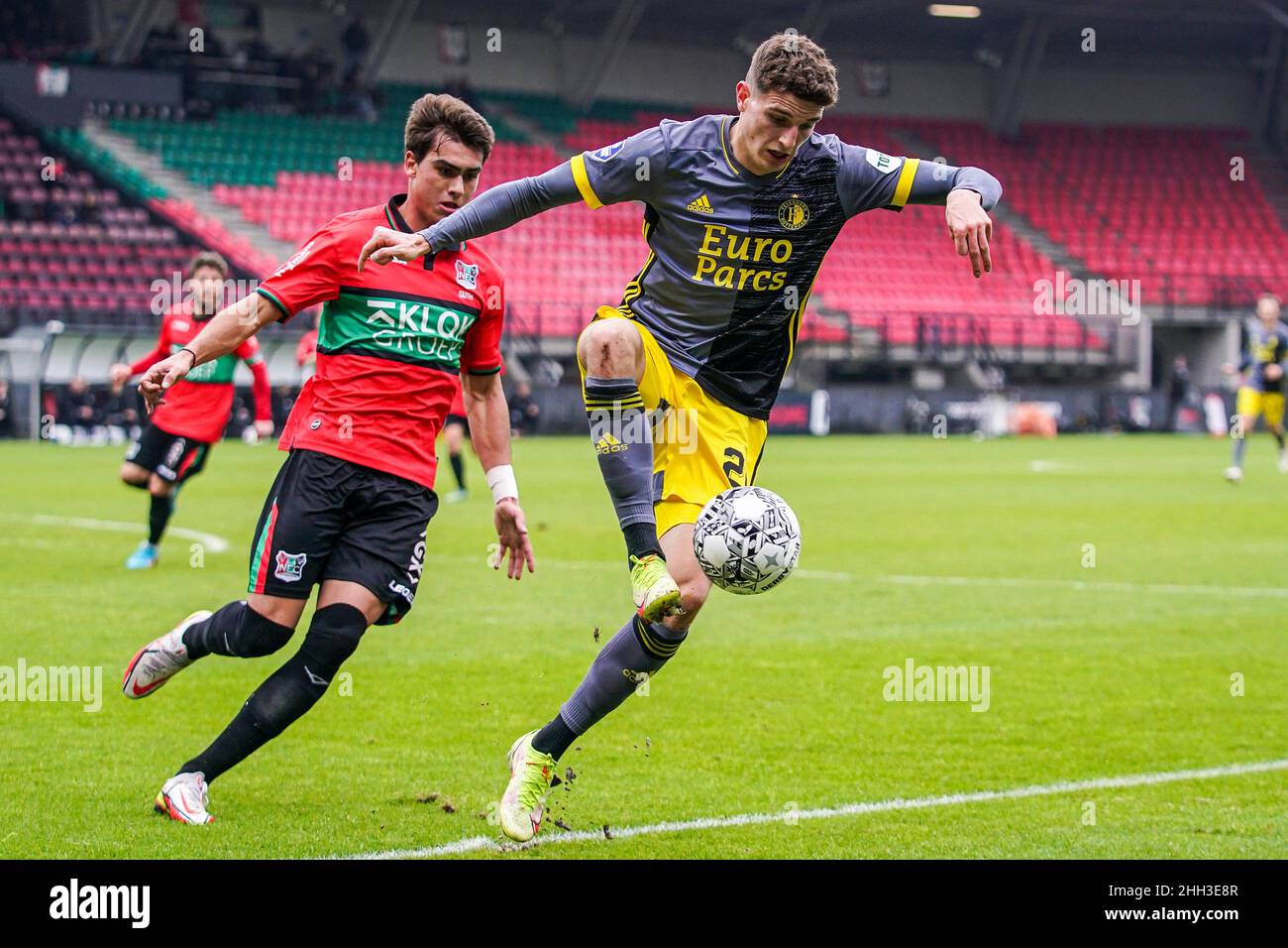 Nijmegen - Rodrigo Guth of NEC, Guus Til of Feyenoord during the match ...