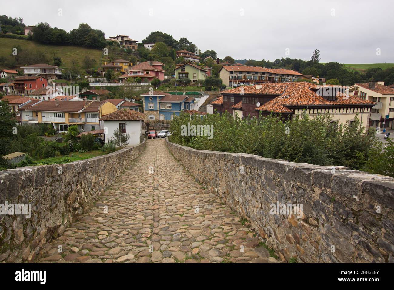 View of Cangas de Onis from the Roman Bridge on the Sella River in ...