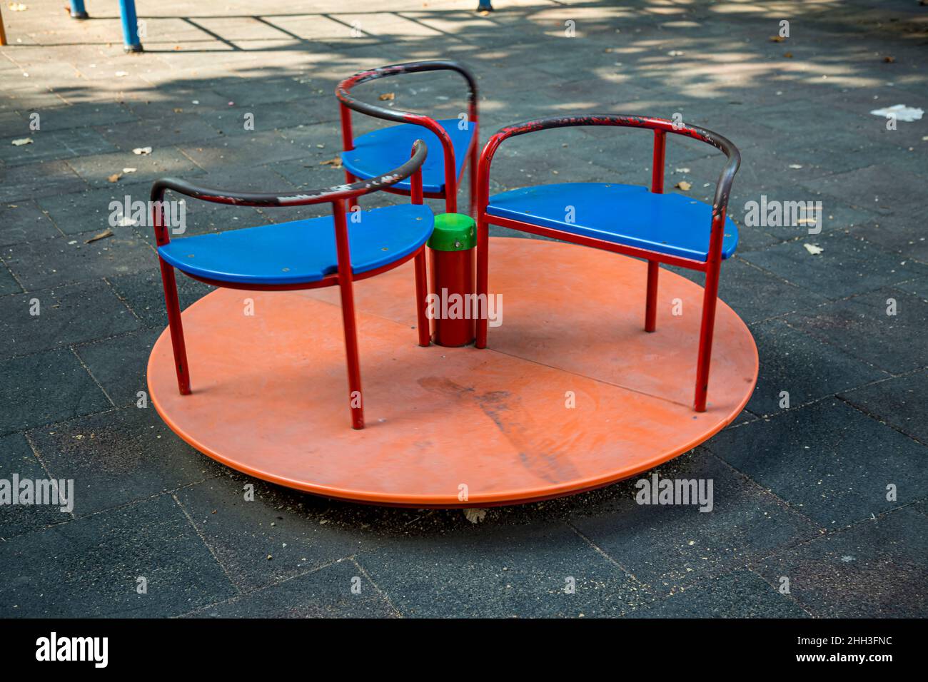Children's carousel in the playground, in the Park Stock Photo - Alamy
