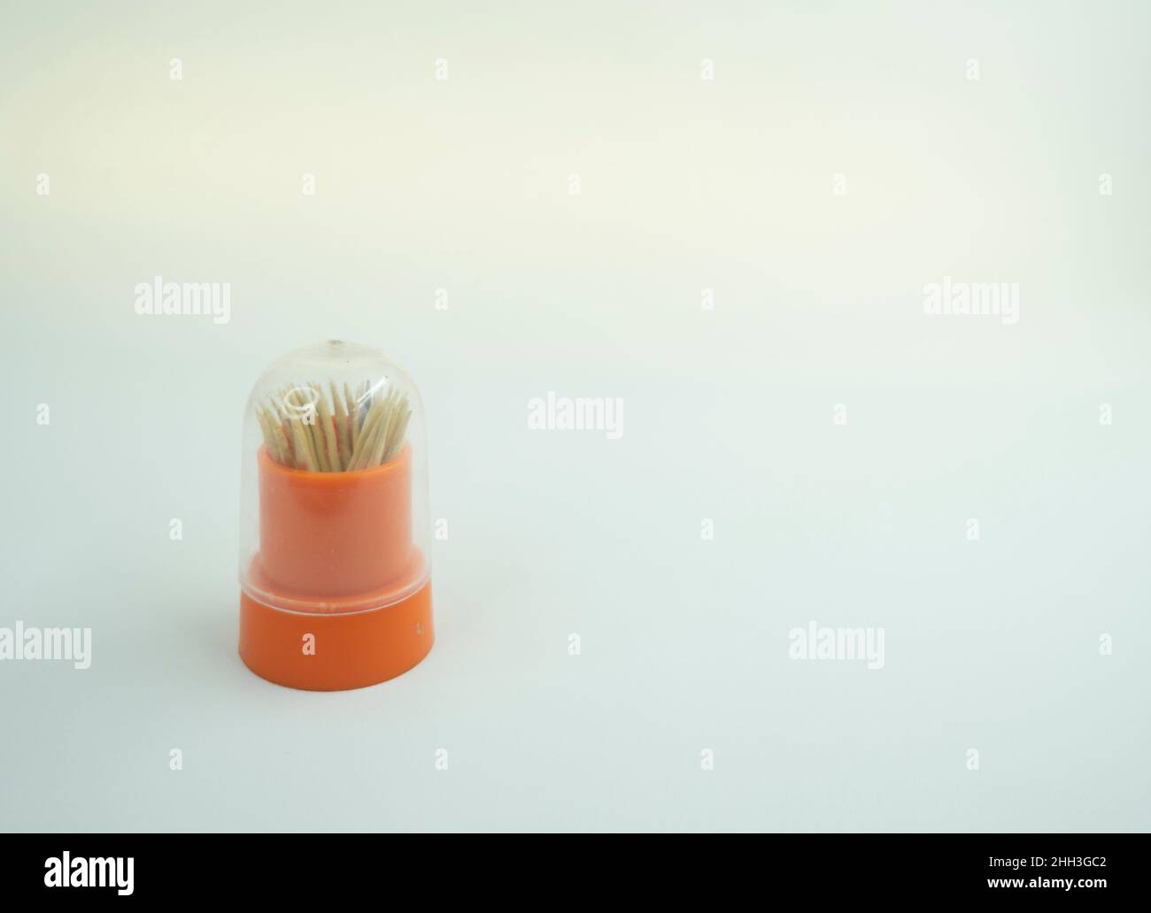 close up photo of toothpick with white background and negative space ...