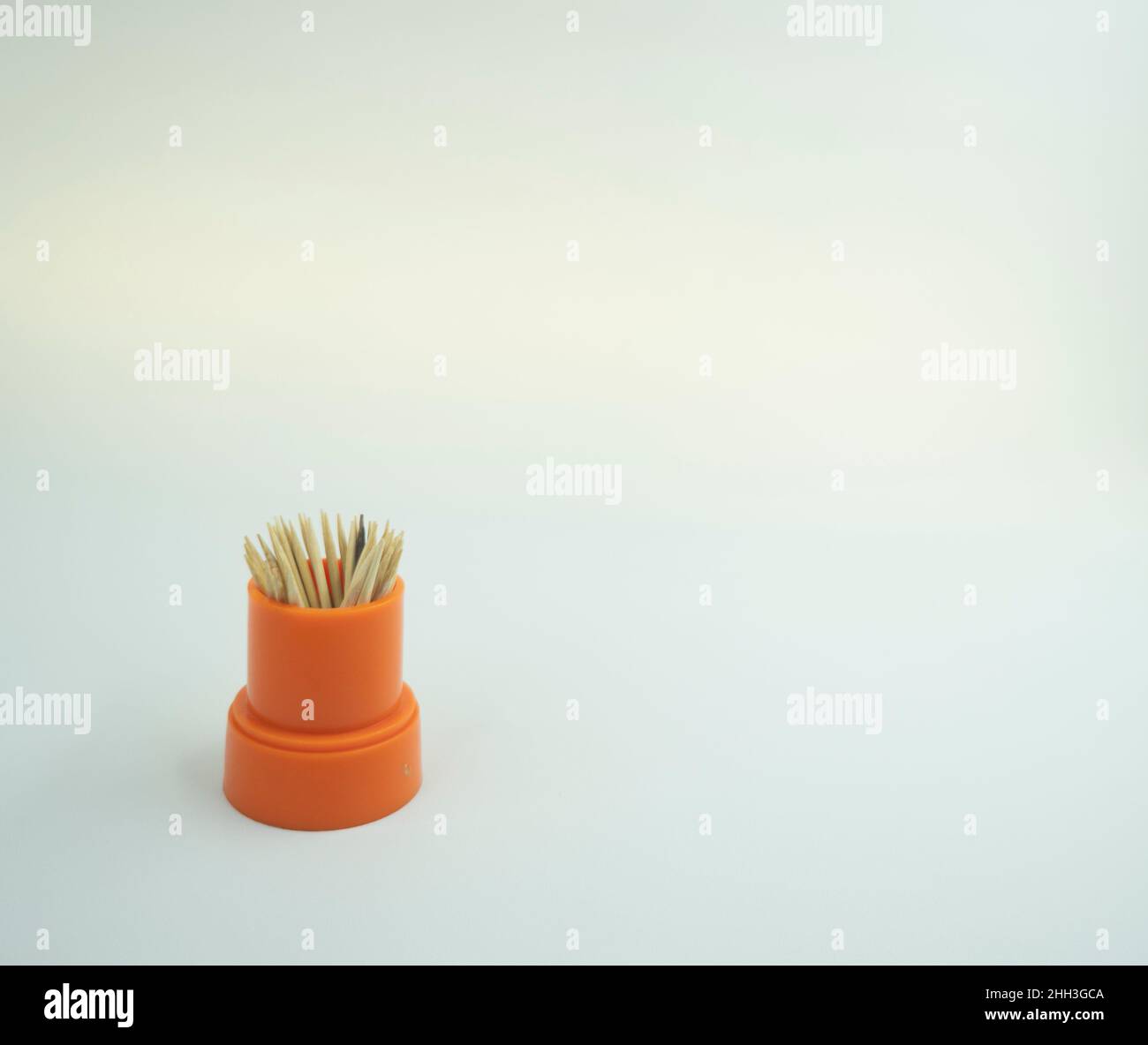 close up photo of toothpick with white background and negative space ...