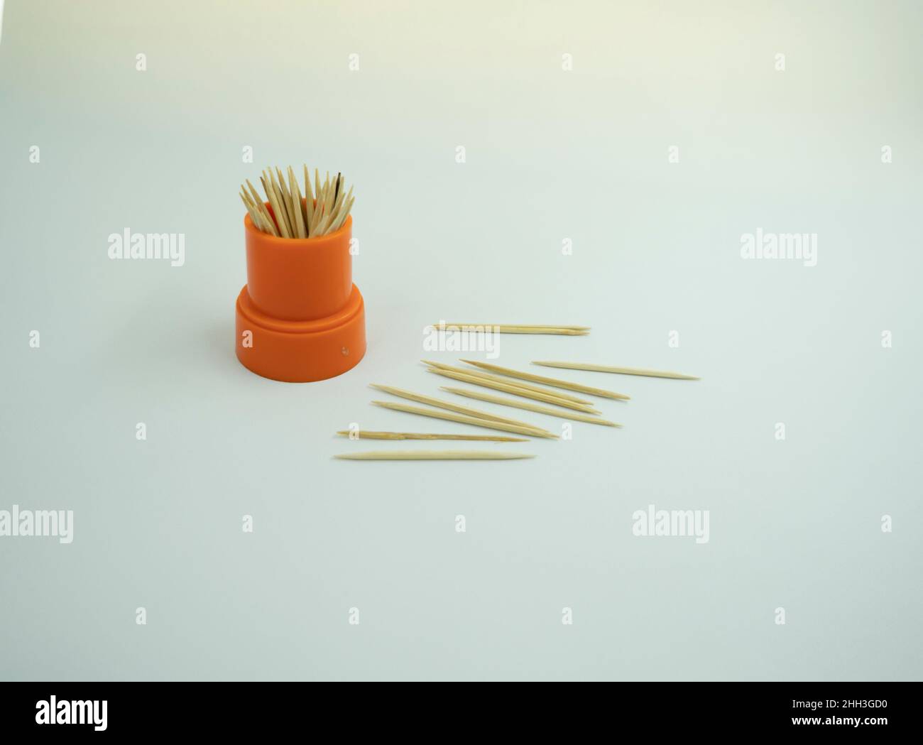 close up photo of toothpick with white background and negative space ...
