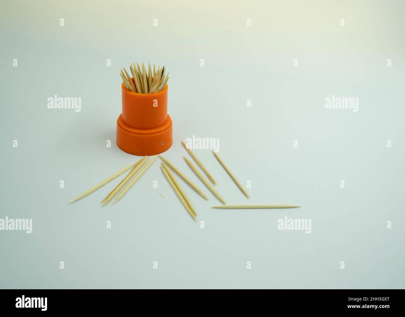 close up photo of toothpick with white background and negative space ...