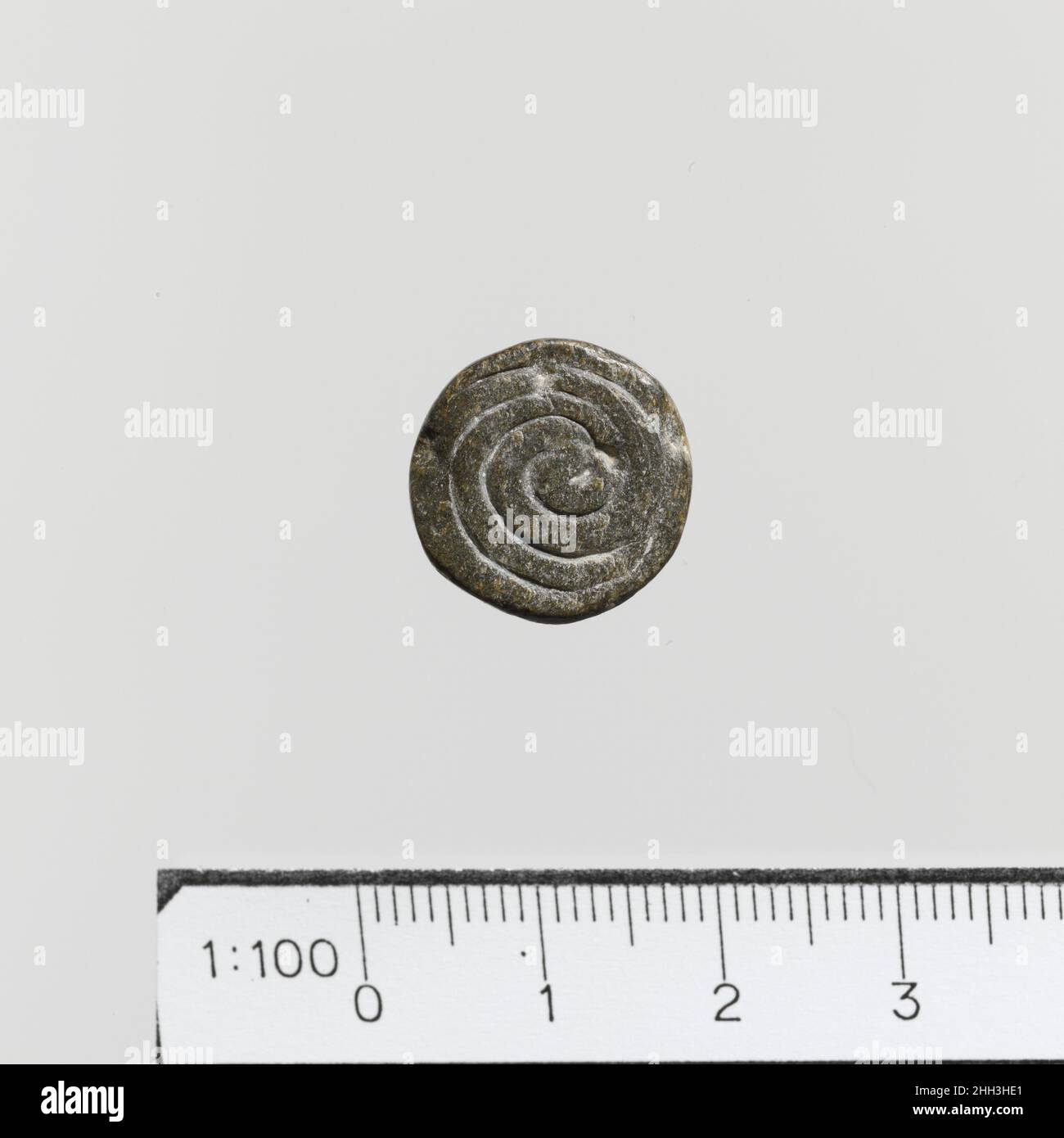 Steatite conoid seal ca. 2400–2200 B.C. Minoan 2 incurving C-spirals ...