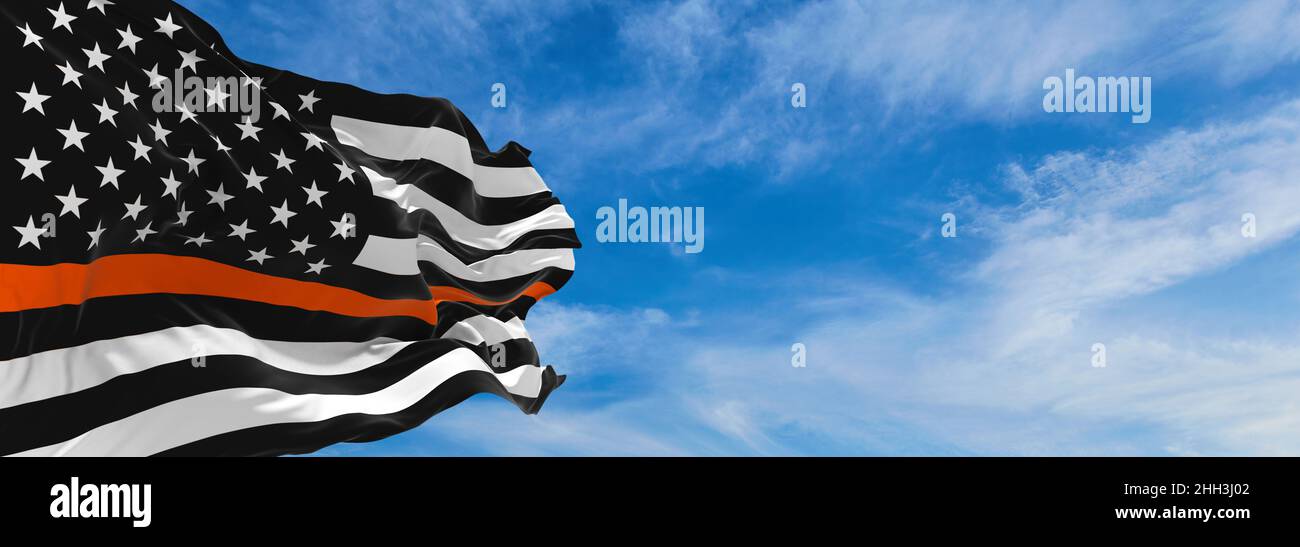 Thin Orange Line USA flag waving at sky background on sunset, panoramic ...