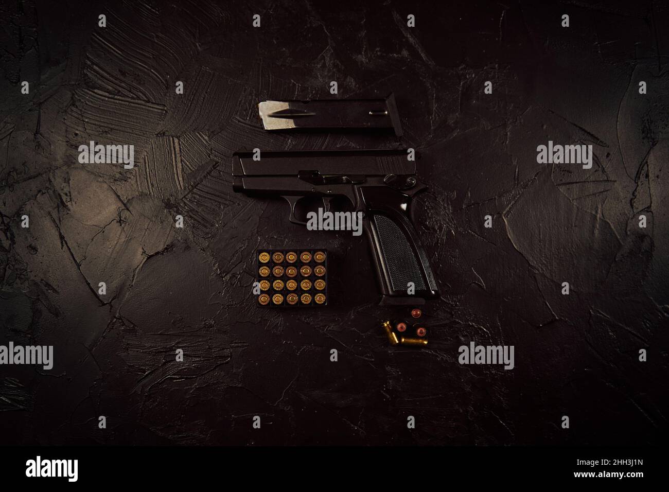 Top view of neatly arranged cartridges and gun Stock Photo - Alamy