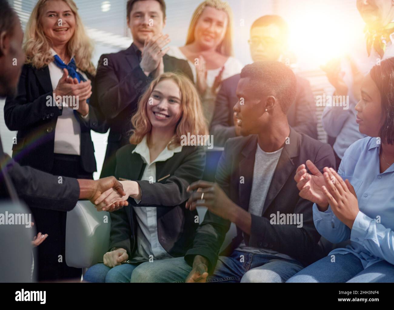 Successful company with happy workers hi-res stock photography and ...