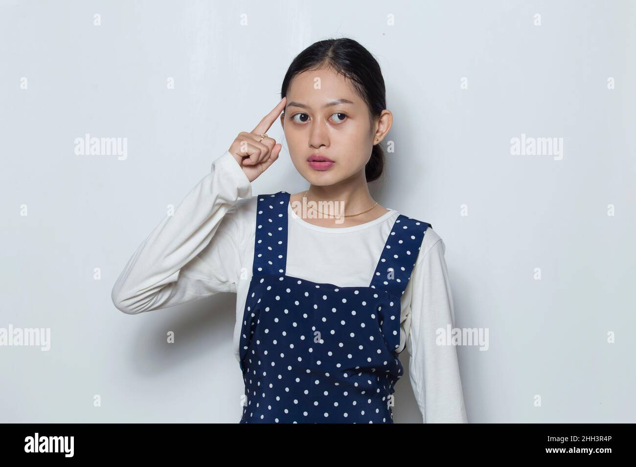 young asian woman thinks idea Stock Photo - Alamy