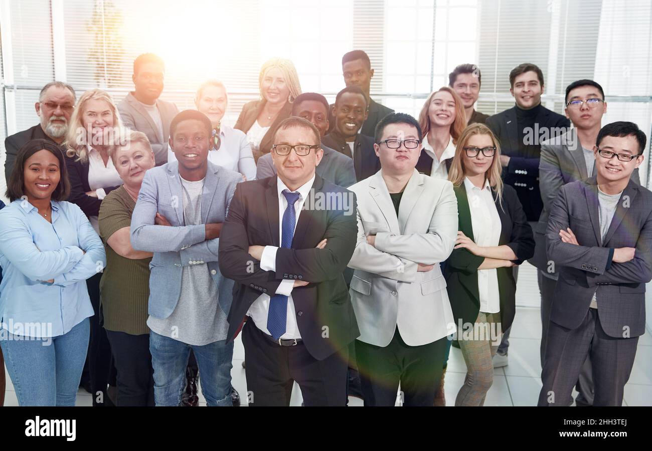 large group of diverse employees standing together. photo with a copy ...