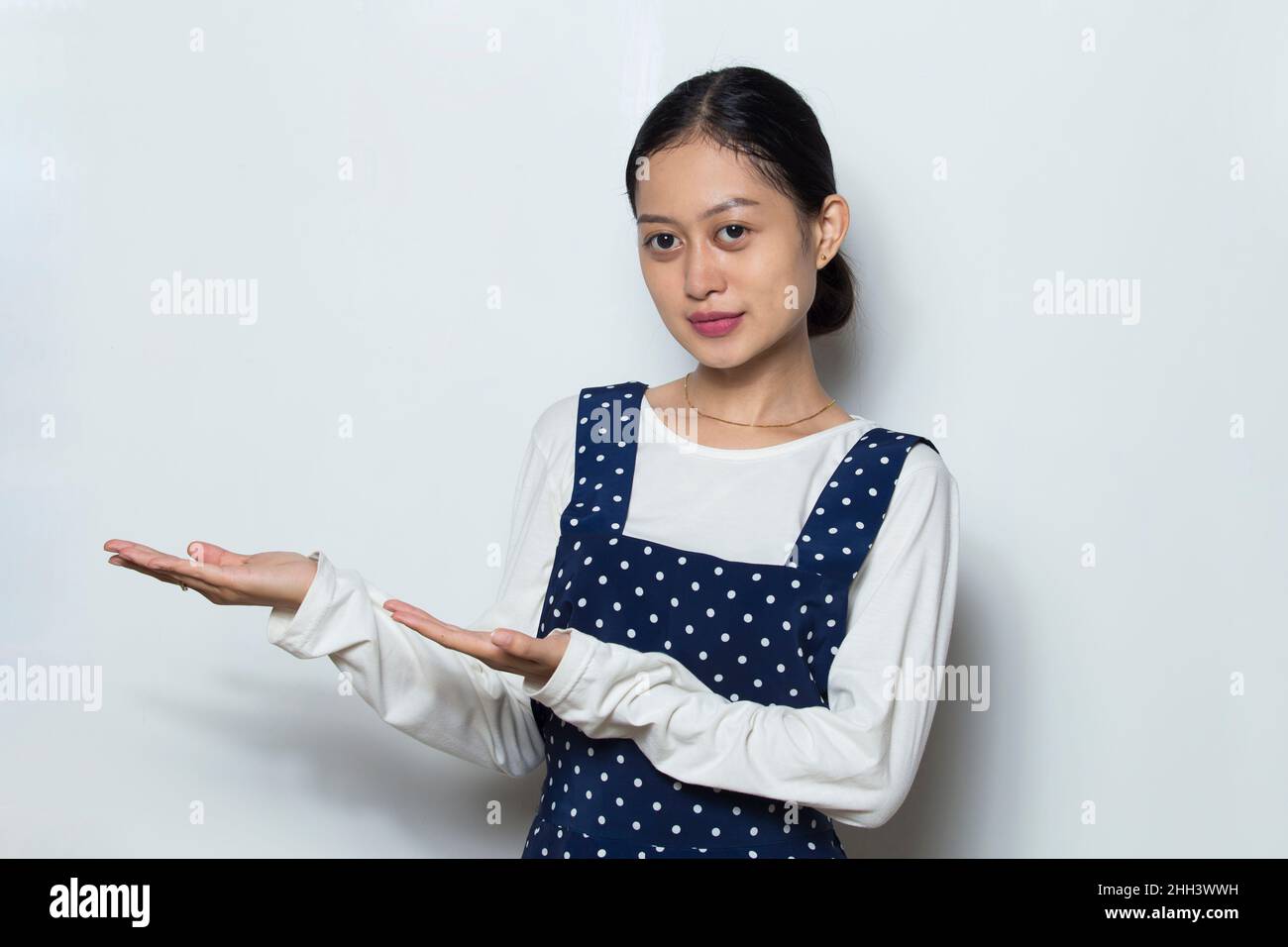 asian woman pointing finger on empty space Stock Photo - Alamy