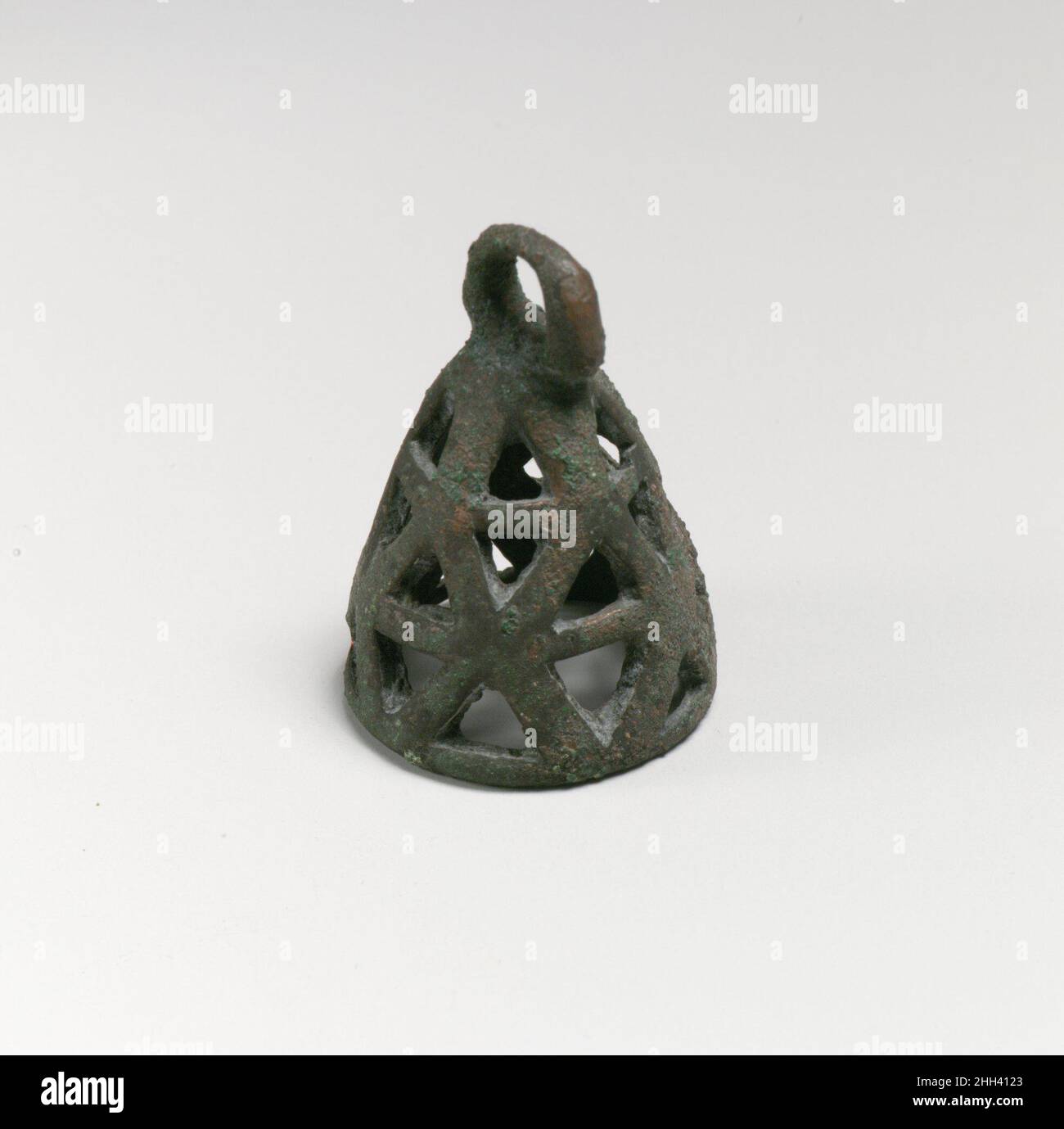 Bell Conical in shape with openwork decoration consisting of a series ...