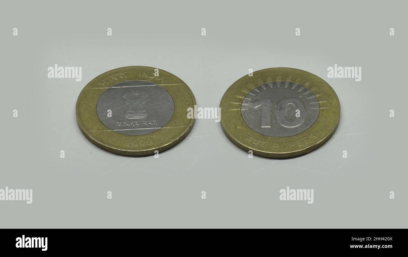 old indian 10 rupees coin with white background Stock Photo - Alamy