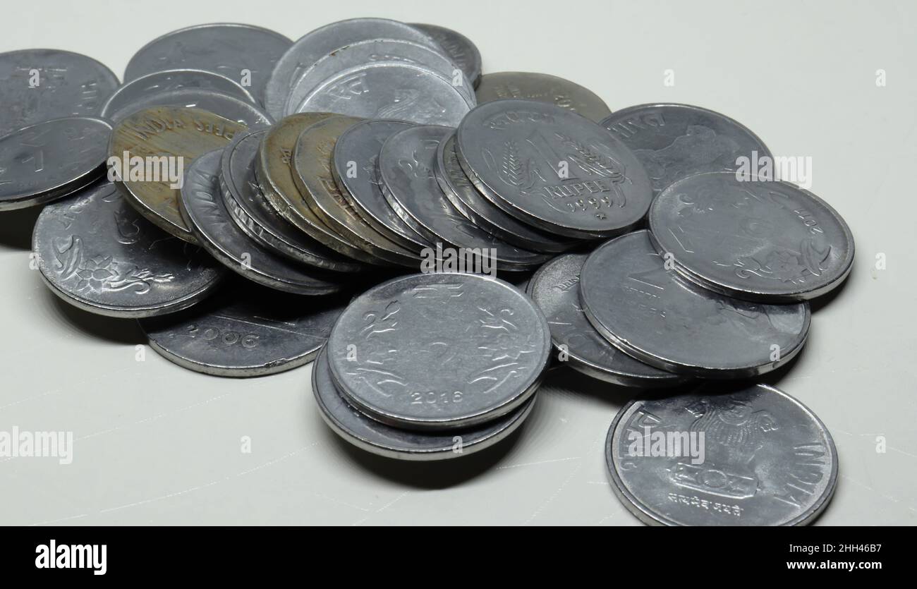 Pile of Indian Rupee Coins. On a white background Stock Photo - Alamy