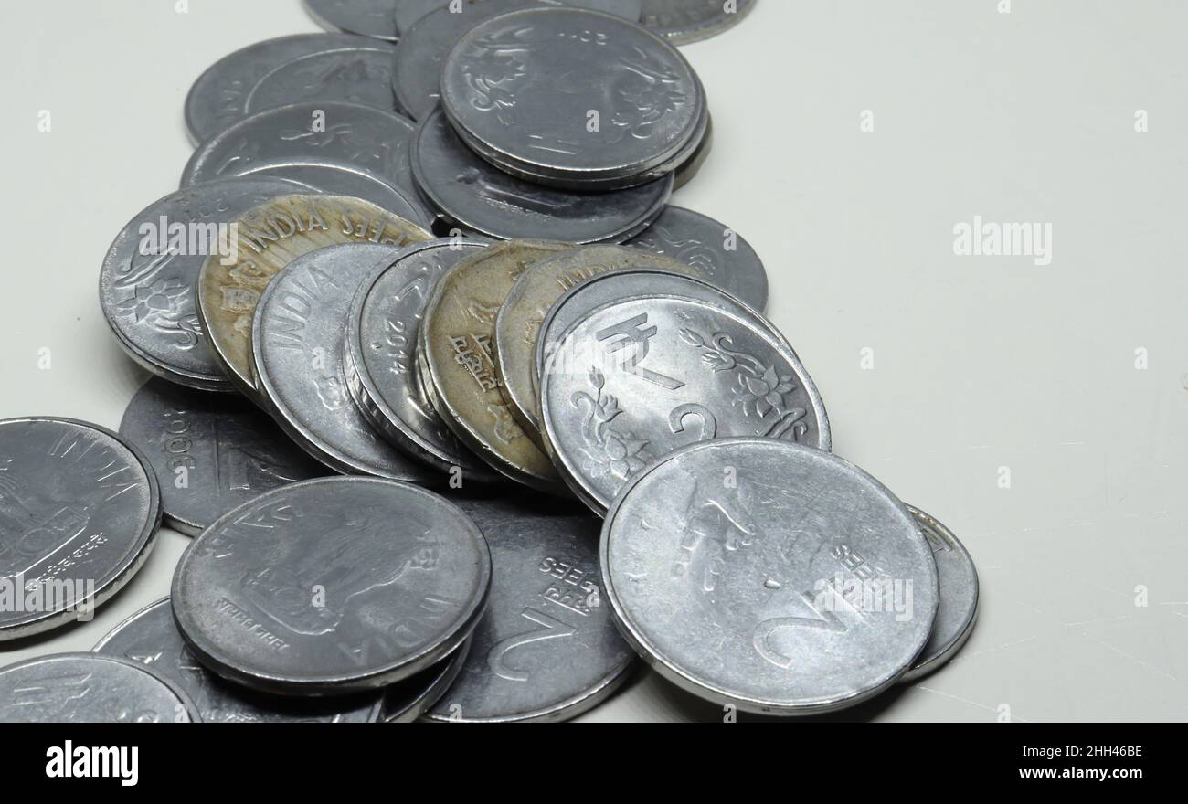 Pile of Indian Rupee Coins. On a white background Stock Photo - Alamy