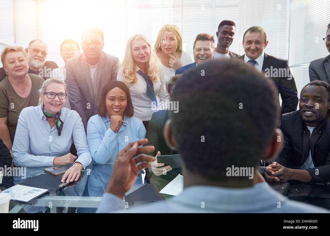 portrait of a large group of diverse employees in the workplace ...
