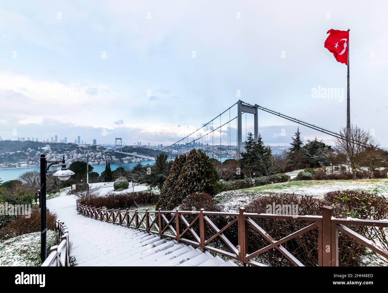 Snowy day in Istanbul, Turkey. View of Fatih Sultan Mehmet Bridge from ...