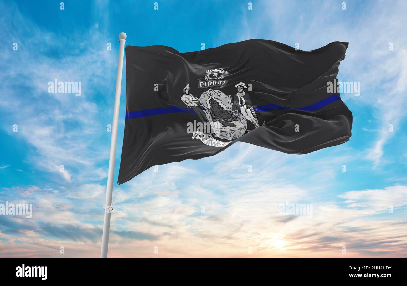 blue line flag of Maine state, Usa at cloudy sky background on sunset ...
