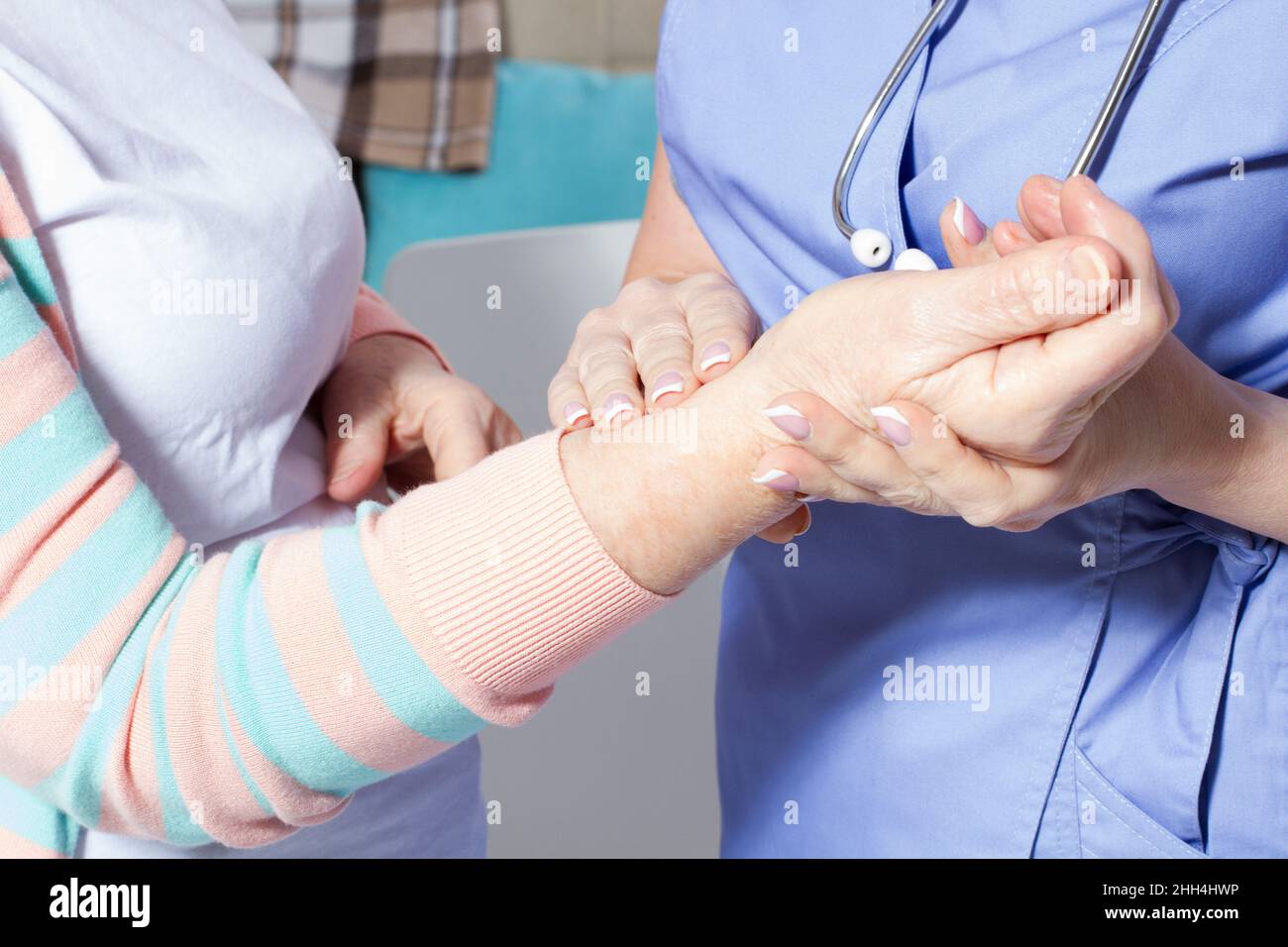 Doctor hands feeling pulse on female wrist, Female doctor measuring ...