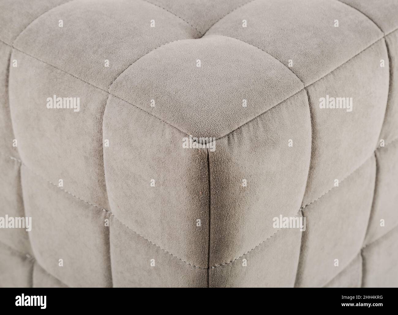 Texture beige fabric. Background of a soft pouf Stock Photo - Alamy