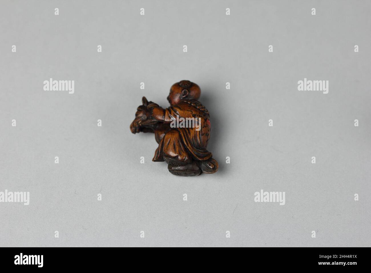 Netsuke of Boy Riding a Hobby Horse 19th century Japan. Netsuke of Boy ...