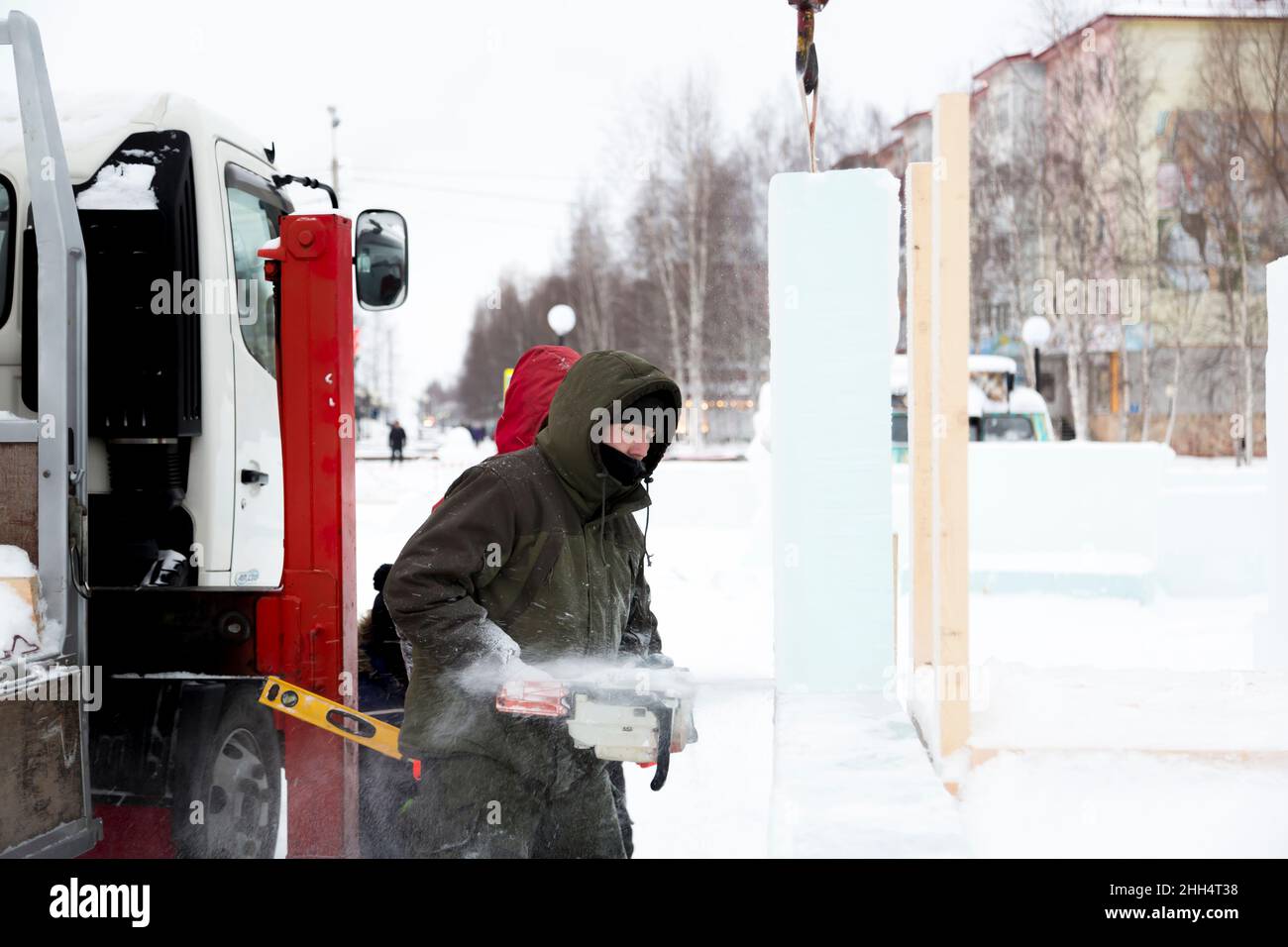 Workman assembler customize chainsaw ice plate Stock Photo - Alamy