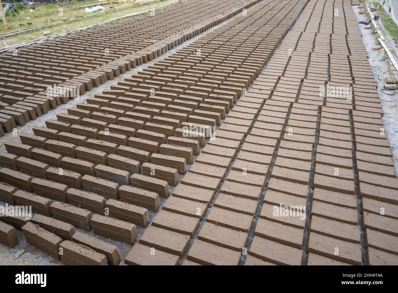Making bricks from clay. After the clay is molded into bricks, after ...