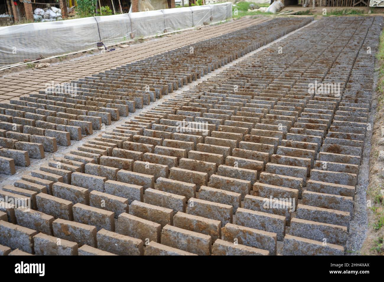 Making bricks from clay. After the clay is molded into bricks, after ...