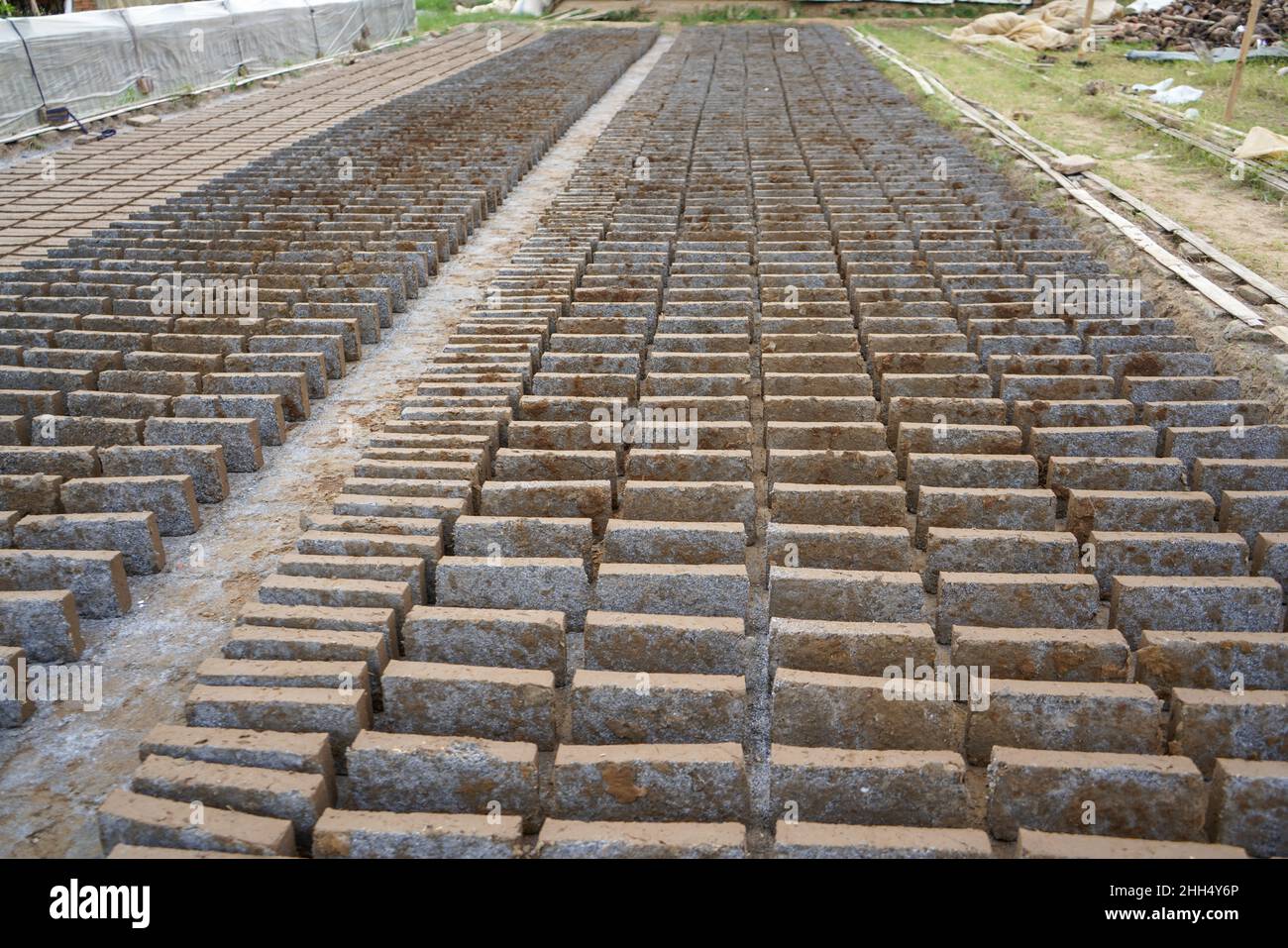 Making bricks from clay. After the clay is molded into bricks, after ...