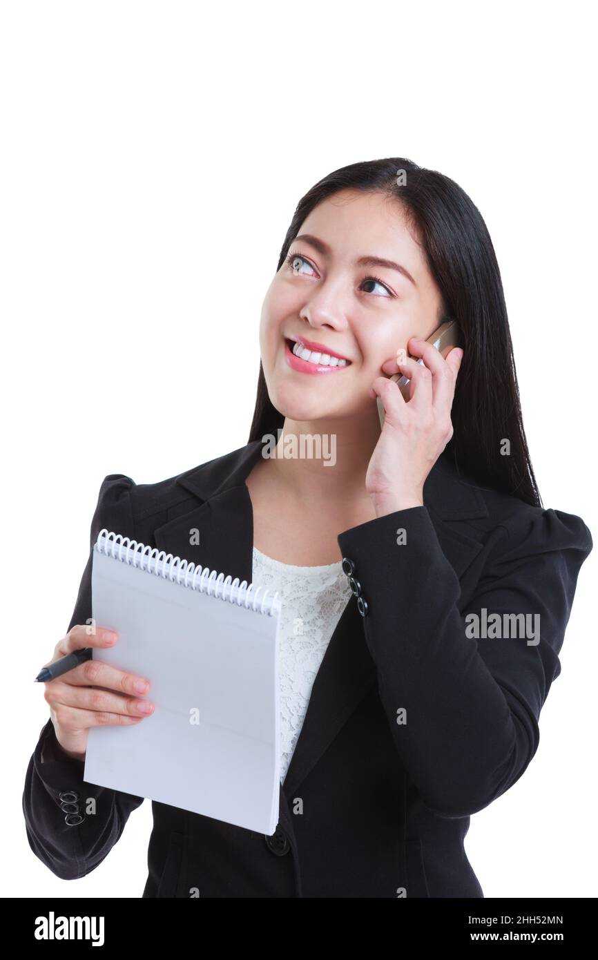 Businesswoman talking on smartphone and holding note paper. Asian woman ...