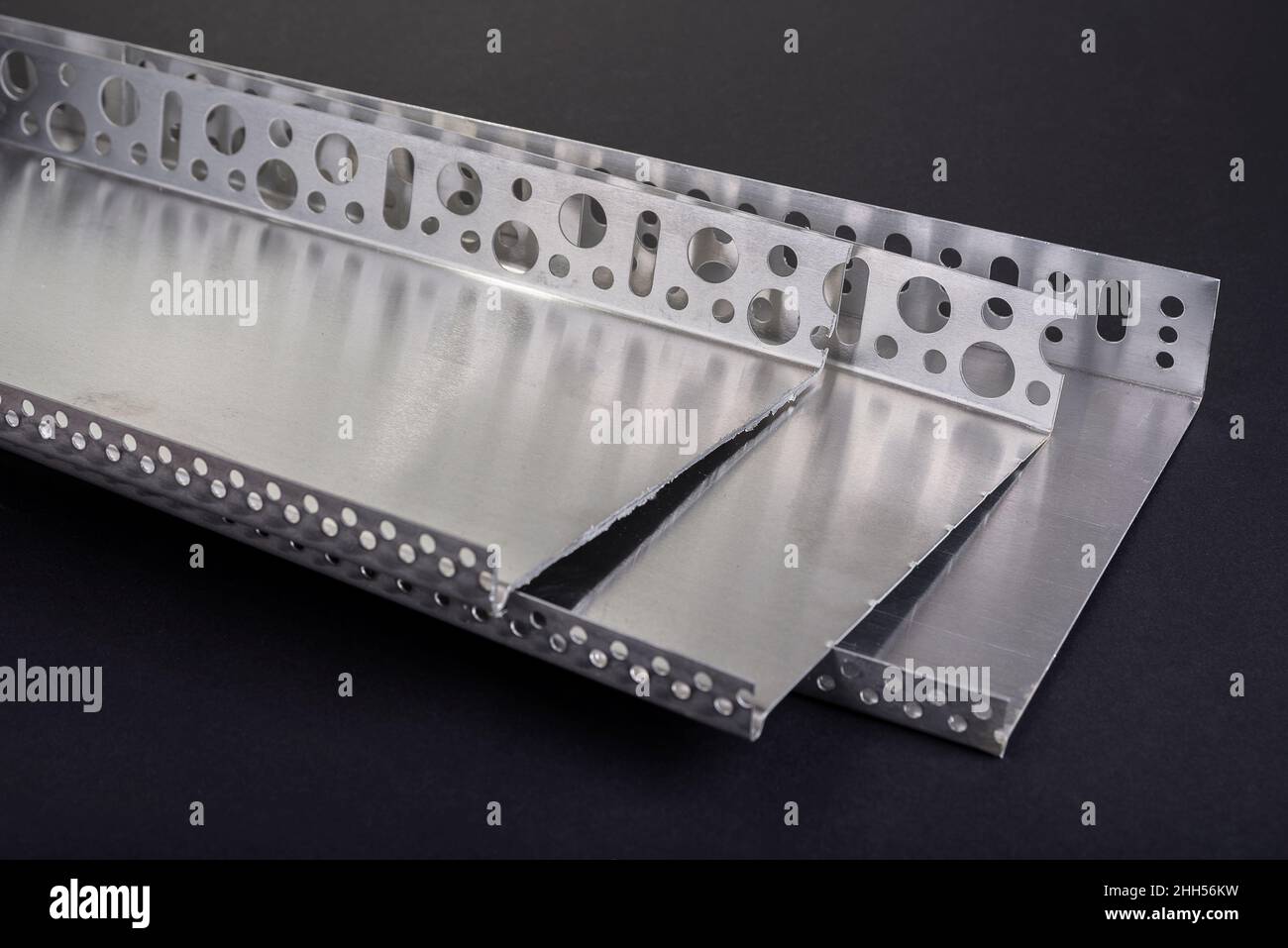 Aluminium base track for a wall insulation Stock Photo - Alamy