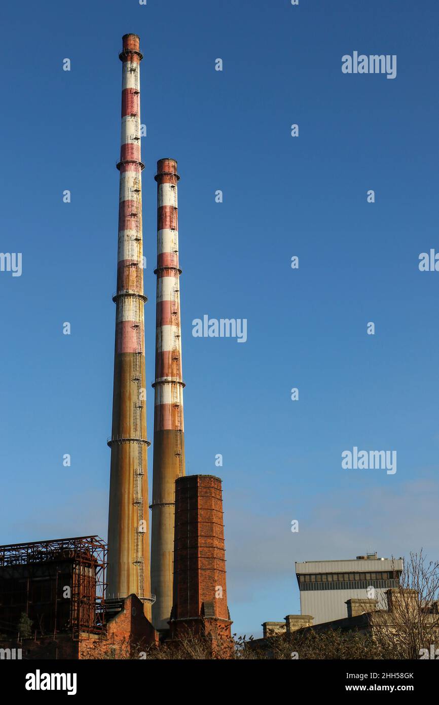 Poolbeg chimneys, Dublin, Ireland. Twin stacks, red and white striped ...
