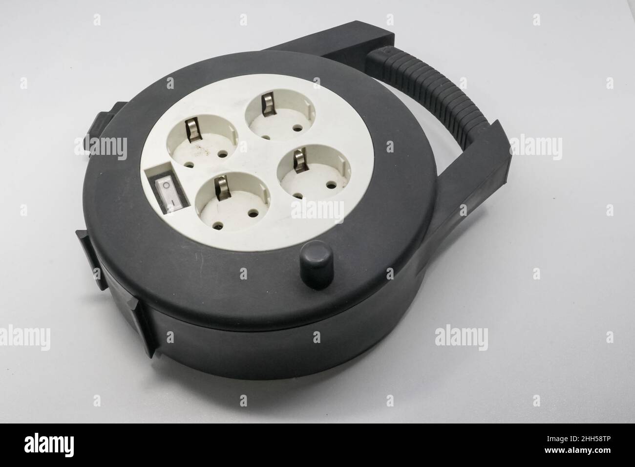 Black Flexible Industrial Cable Roll Extension with White Background ...