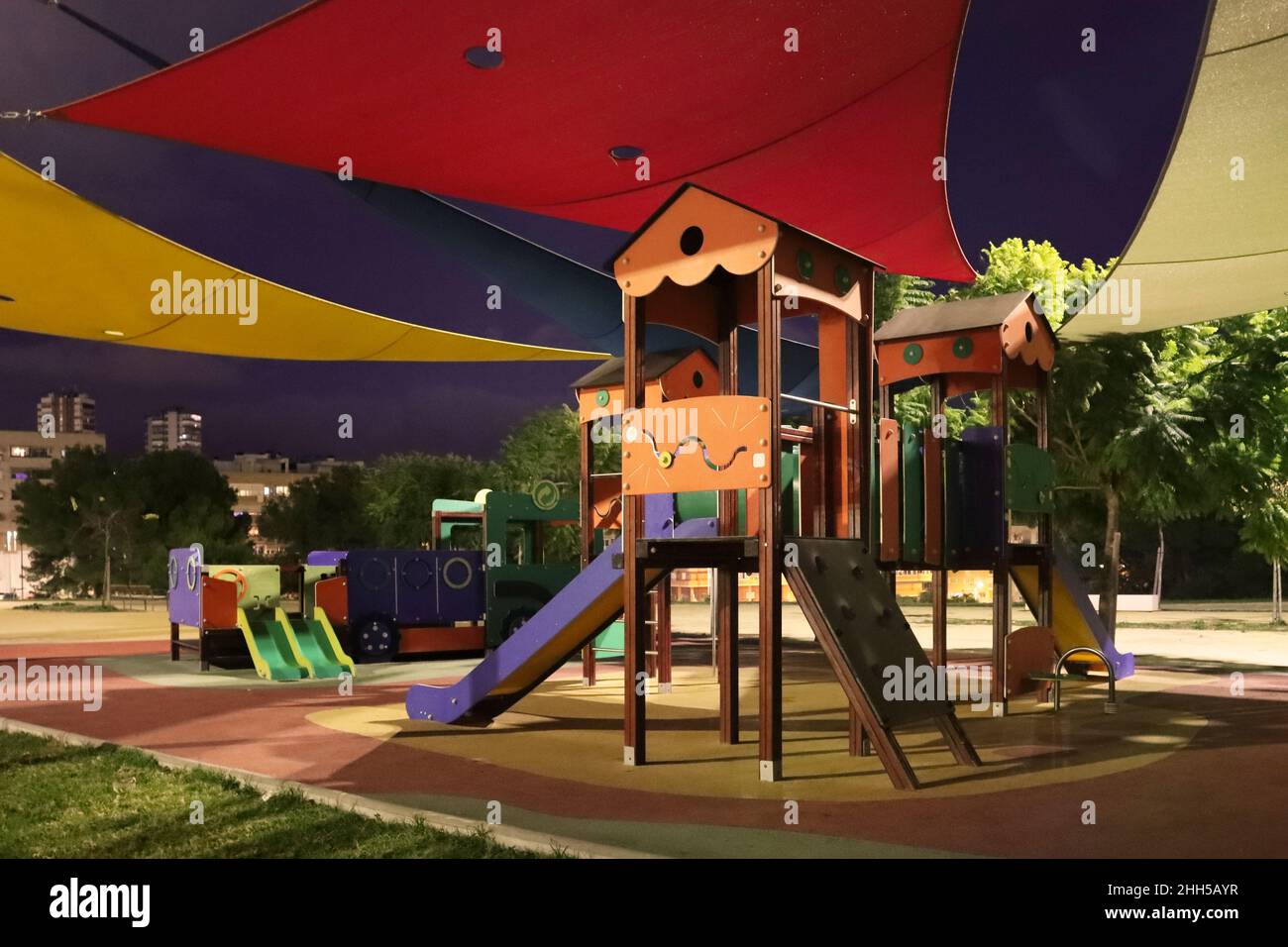 photograph of children's playground at night and without people Stock ...