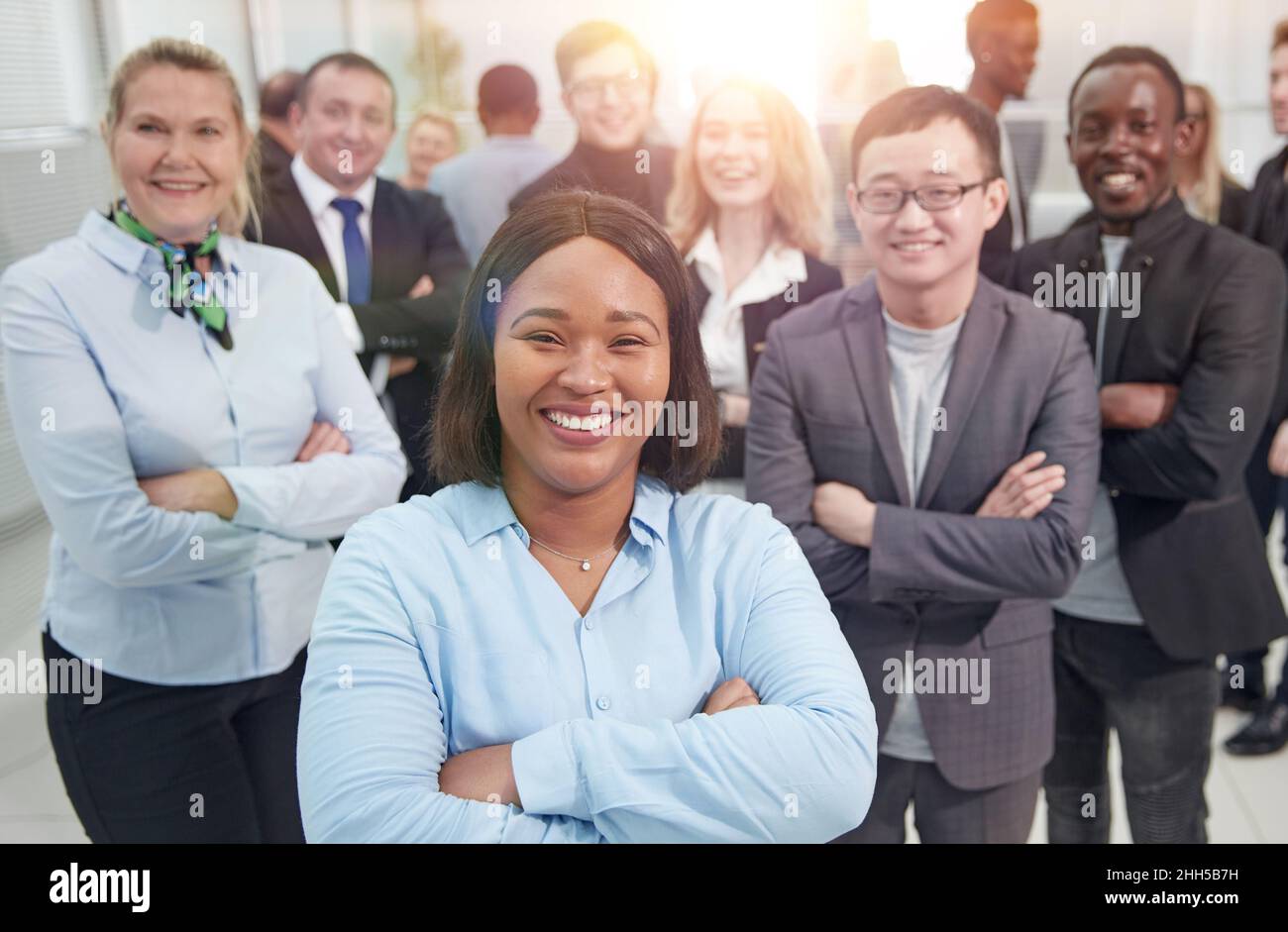 group of leading experts standing in the office lobby . concept of ...