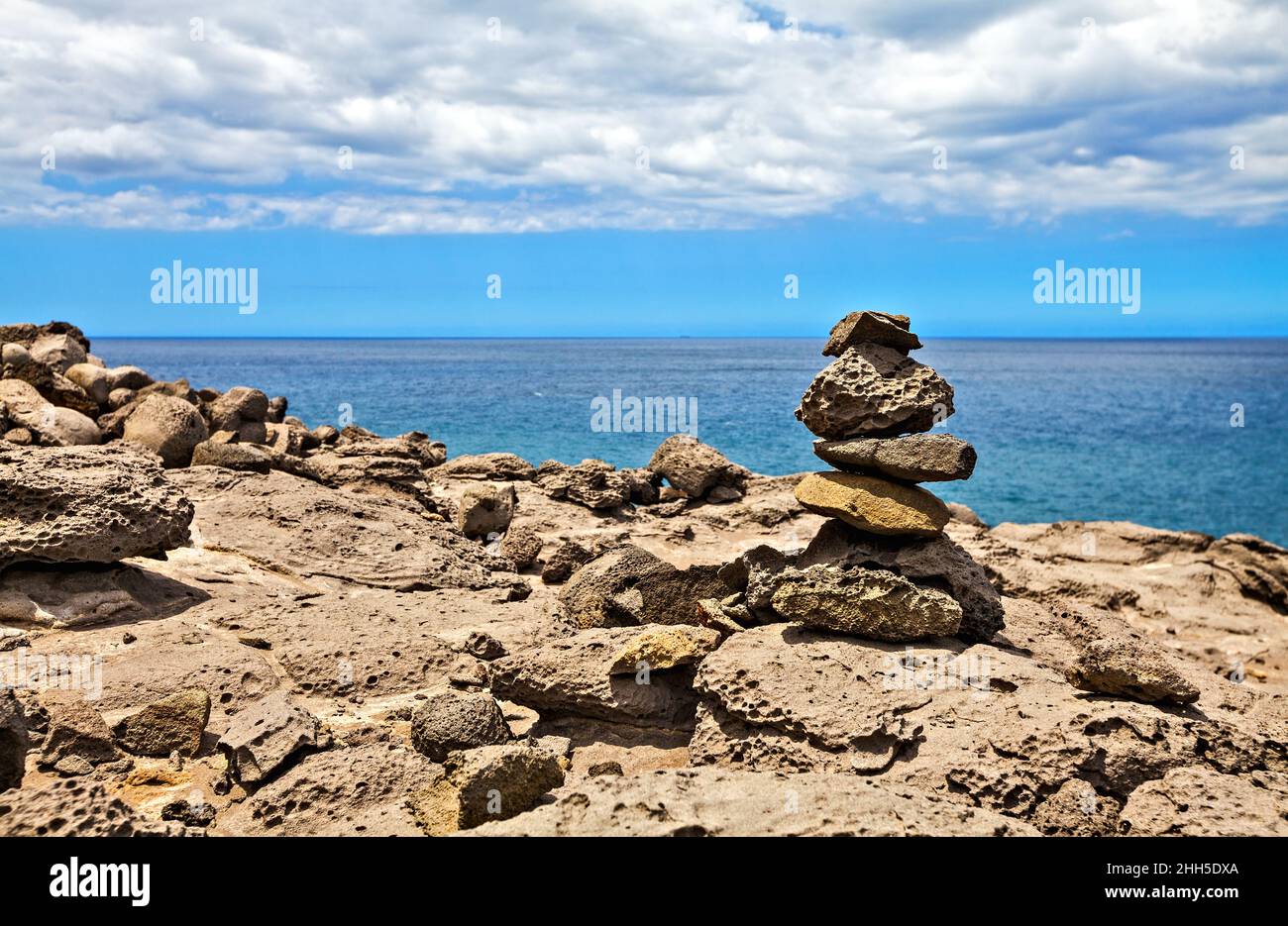 Five stones are on an rocky coast. Mauritius, The Indian Ocean Stock ...